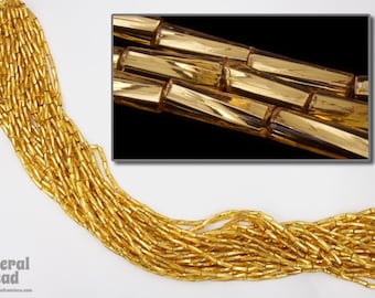 Gold bugle beads | Etsy