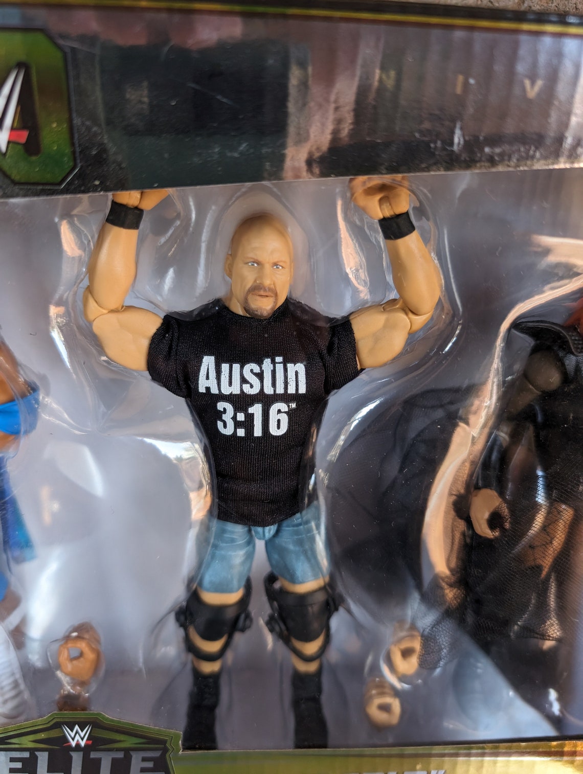 WWE Elite Collection Set of 4 Figures Hulk Hogan , Rocky Maivia , Stone Cold Steve Austin and ...