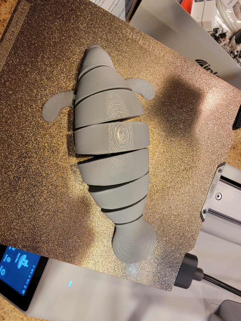 3D Printed Articulated Manatee Toy Customizable by Color by Acclaimed ...