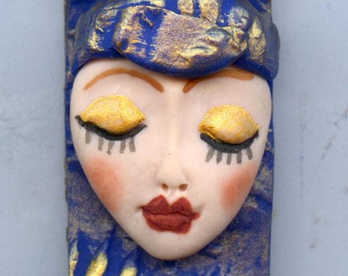 A Dark Blue and Gold Polymer Clay Art Dol Component 1 1/2" X 1 1/8 ...