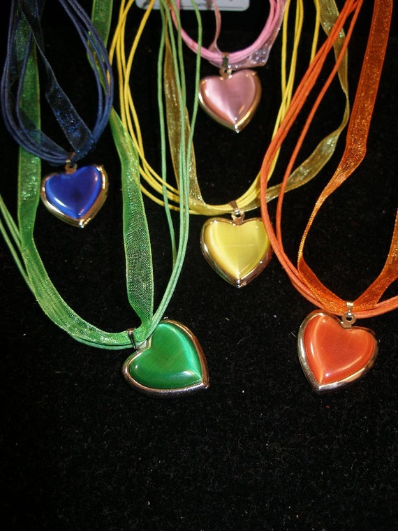 Items similar to Catseye locket, ribbon and cord necklace - many color ...