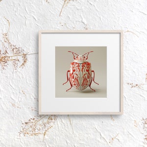 Porcelain Beetle With Red Floral Designs and Delicate Antennae, Unique ...