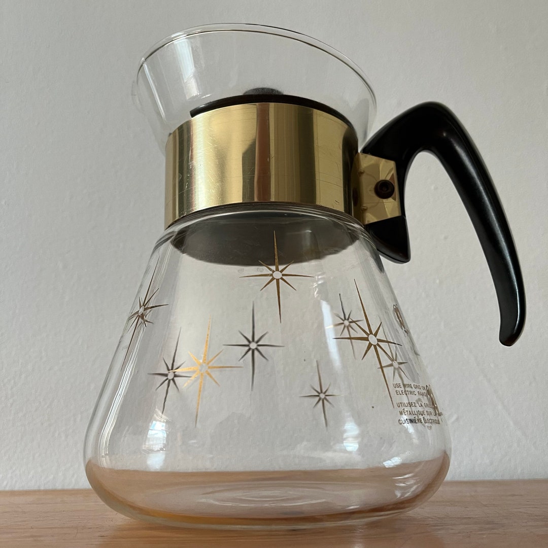 Vintage Corning Ware Heat Proof Glass Gold Atomic Starburst Graduated ...
