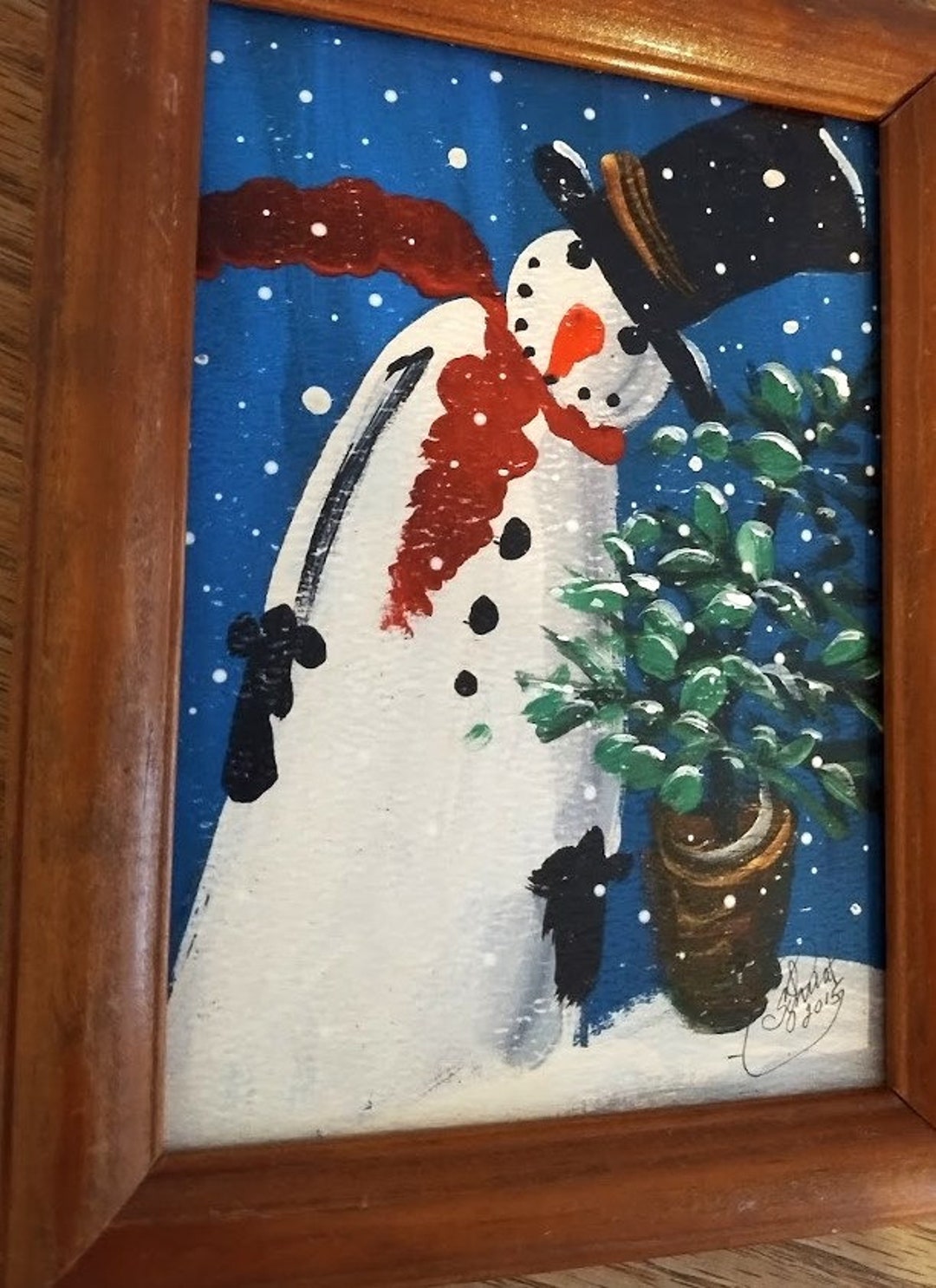 Leaning Snowman With Evergreen Christmas Tree in the Snow Framed Print ...