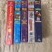 A Collection of Classic VHS Tapes Featuring Beloved Children's Shows ...
