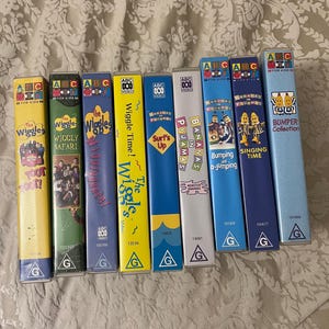 A Collection of Classic VHS Tapes Featuring Beloved Children's Shows ...