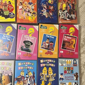 A Collection of Classic VHS Tapes Featuring Beloved Children's Shows ...