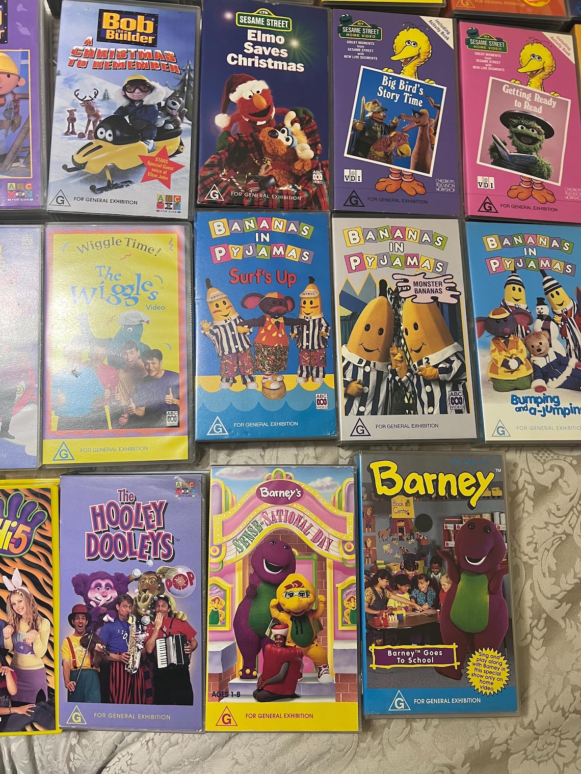 A Collection of Classic VHS Tapes Featuring Beloved Children's Shows ...