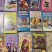 A Collection of Classic VHS Tapes Featuring Beloved Children's Shows ...