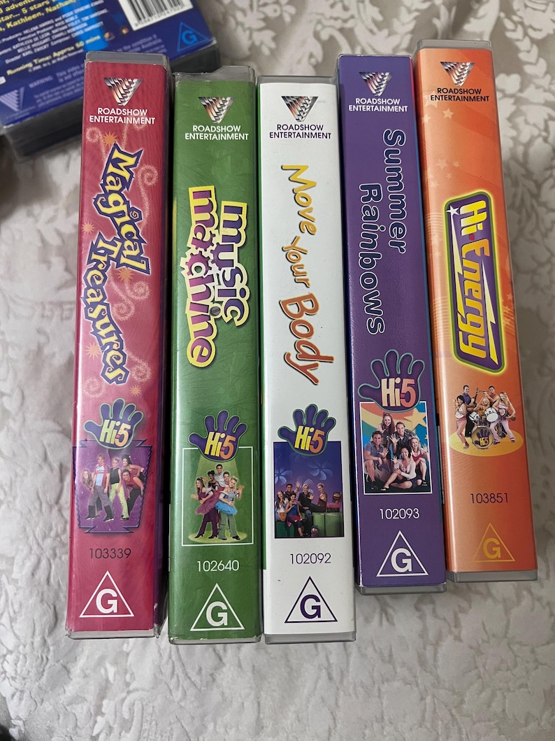 A Collection of Classic VHS Tapes Featuring Beloved Children's Shows ...