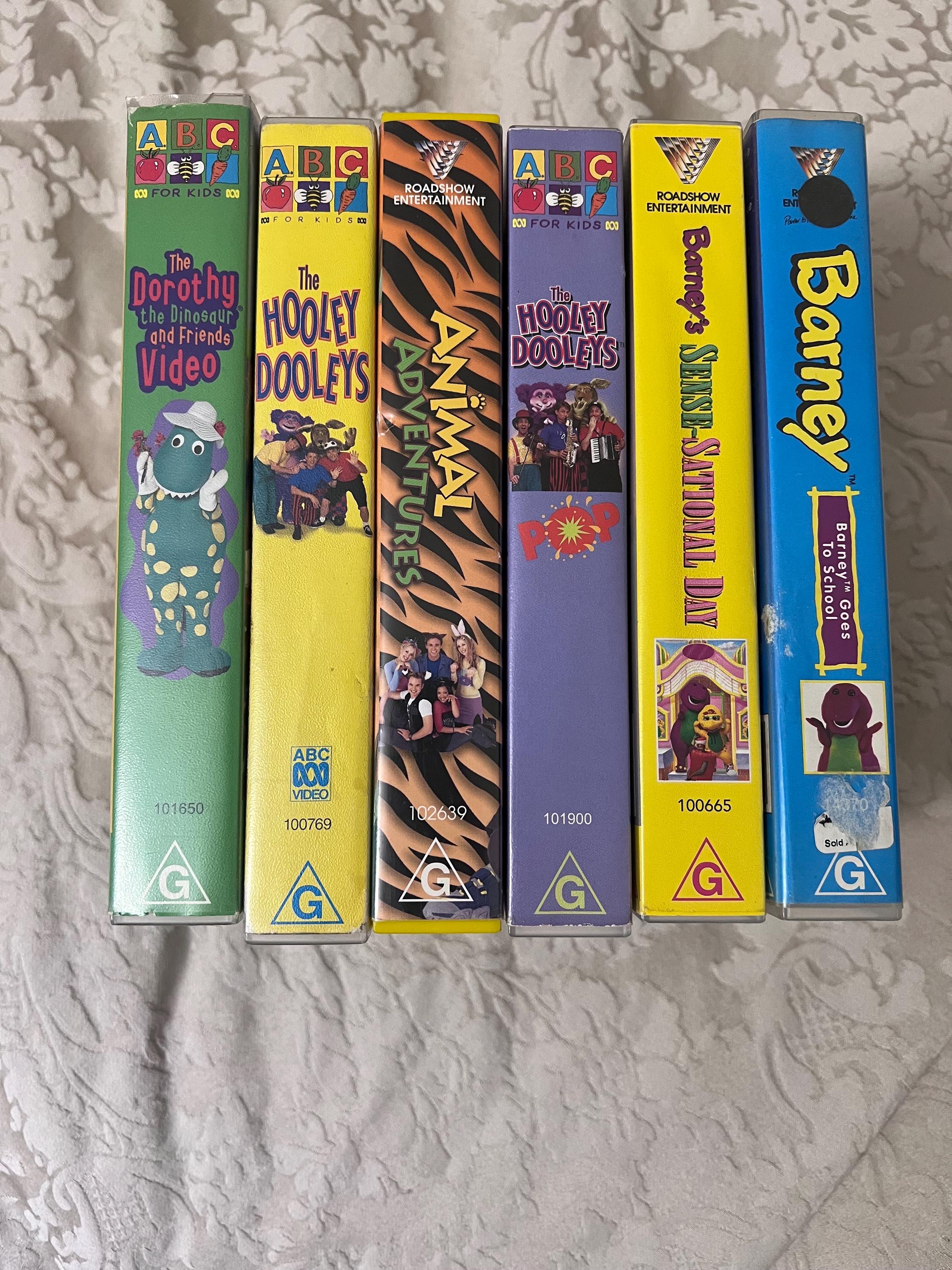 A Collection of Classic VHS Tapes Featuring Beloved Children's Shows ...