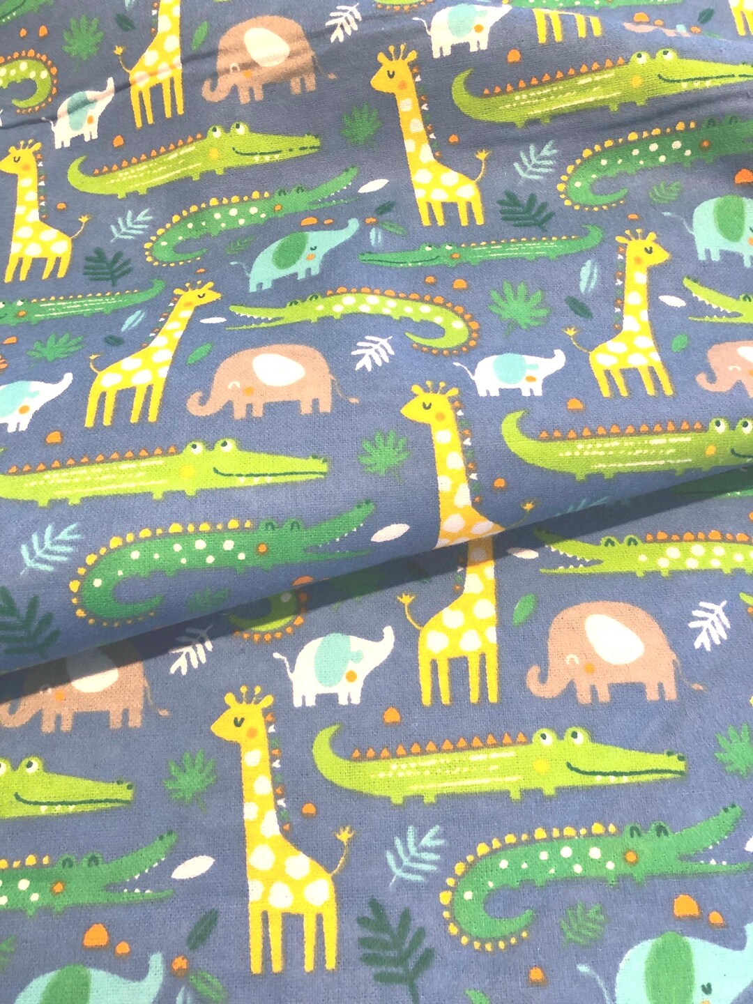 Zoo Animals Tossed Flannel Fabric - BTY - Zoo Animals on a Blue ...