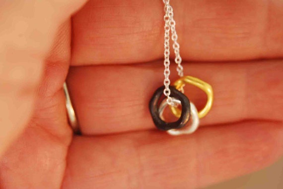 Items similar to Triple Karma Circles on Etsy