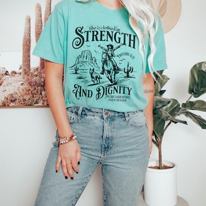 Christian Western PNG Sublimation Designs She is Clothed in Strength ...