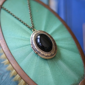 Stone Oval Locket Necklaces in Onyx, Black and Gray Snowflake Obsidian ...