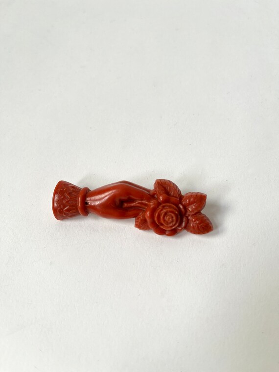 Antique Bakelite Brooch Carved Hand with Flowers in O… - Gem