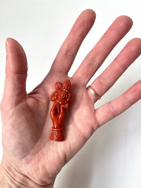 Antique Bakelite Brooch Carved Hand with Flowers in O… - Gem