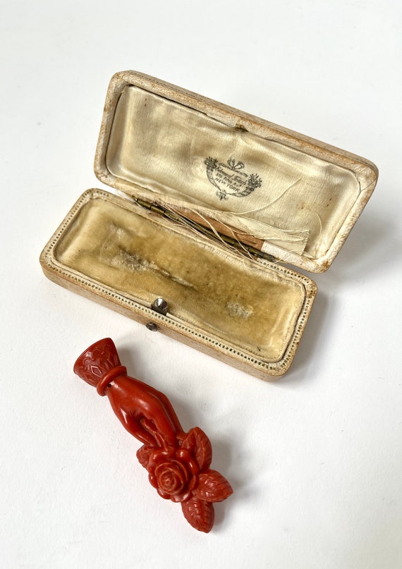 Antique Bakelite Brooch Carved Hand with Flowers in O… - Gem