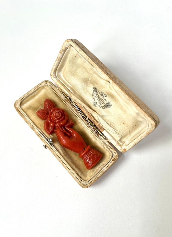 Antique Bakelite Brooch Carved Hand with Flowers in O… - Gem
