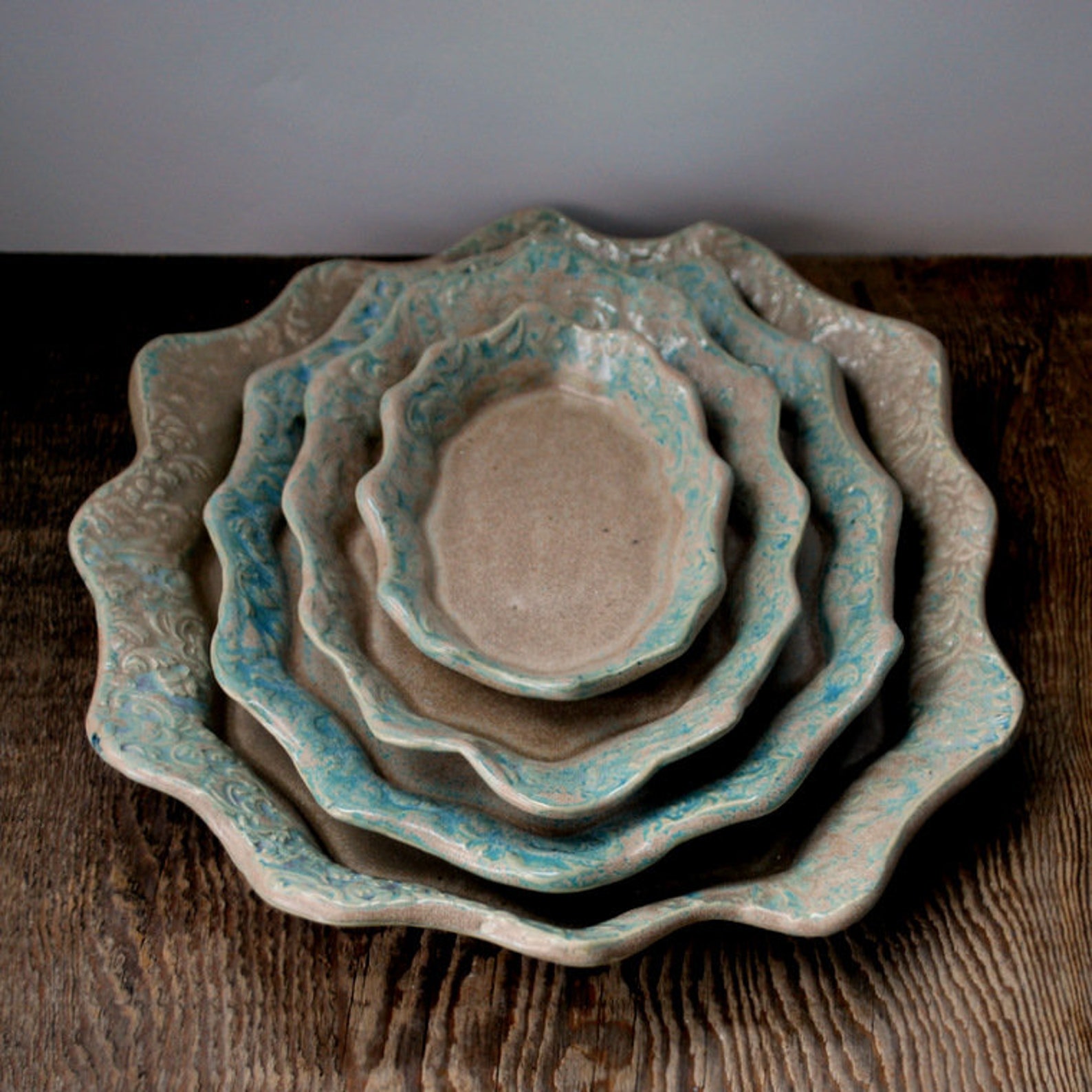 Set of Four Ceramic Tan Nesting Plates or Bowls With Aqua - Etsy