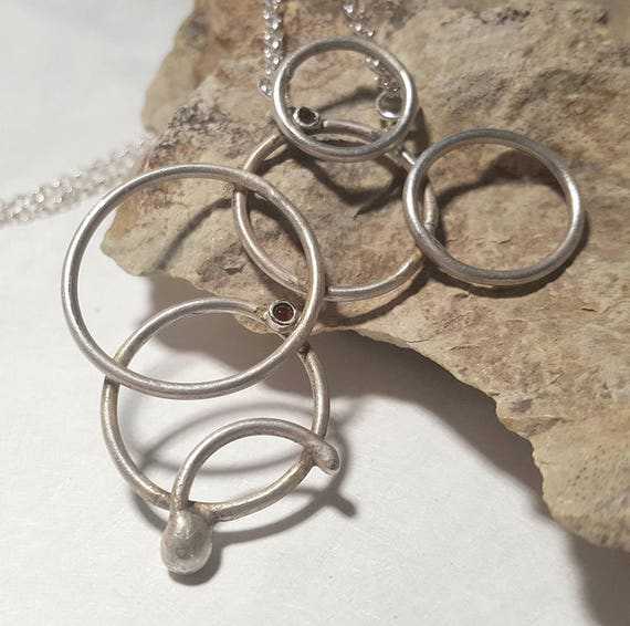 Circus Rings sterling silver pendant | Etsy