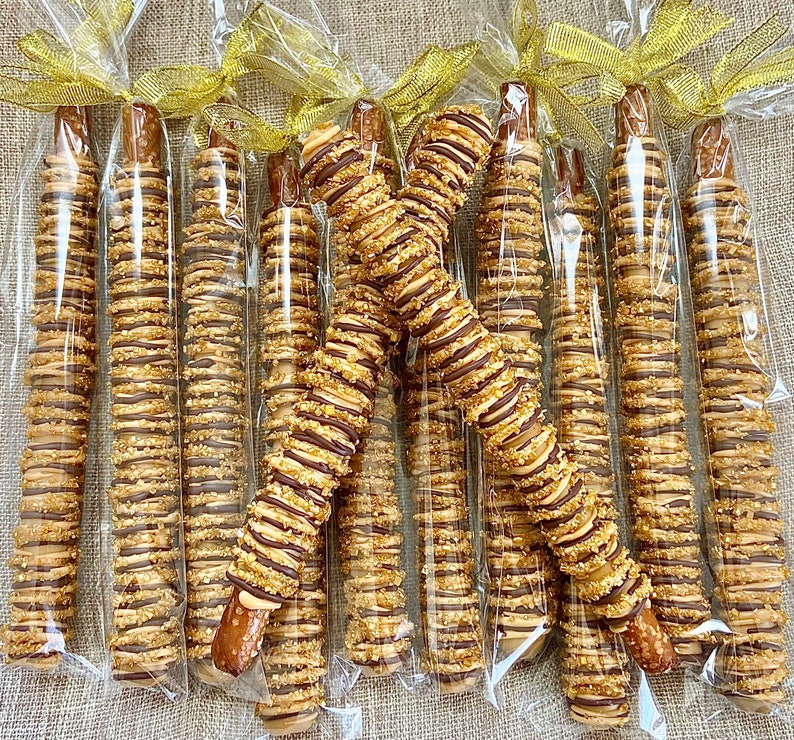 Caramel Coated Pretzel Rods With Chocolate Drizzle & Golden Sugar ...