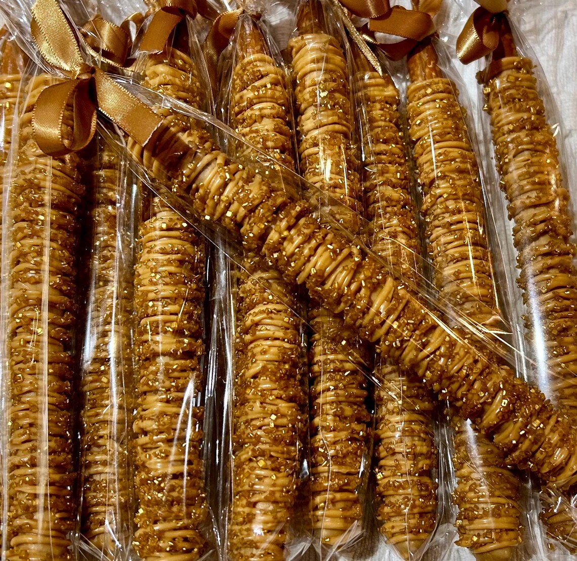Pretzel Rods Coated in Carmel Flavored White Chocolate With Golden ...