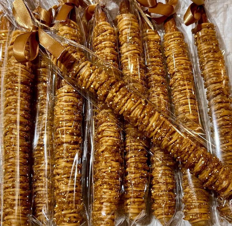 Pretzel Rods Coated in Carmel Flavored White Chocolate With Golden ...
