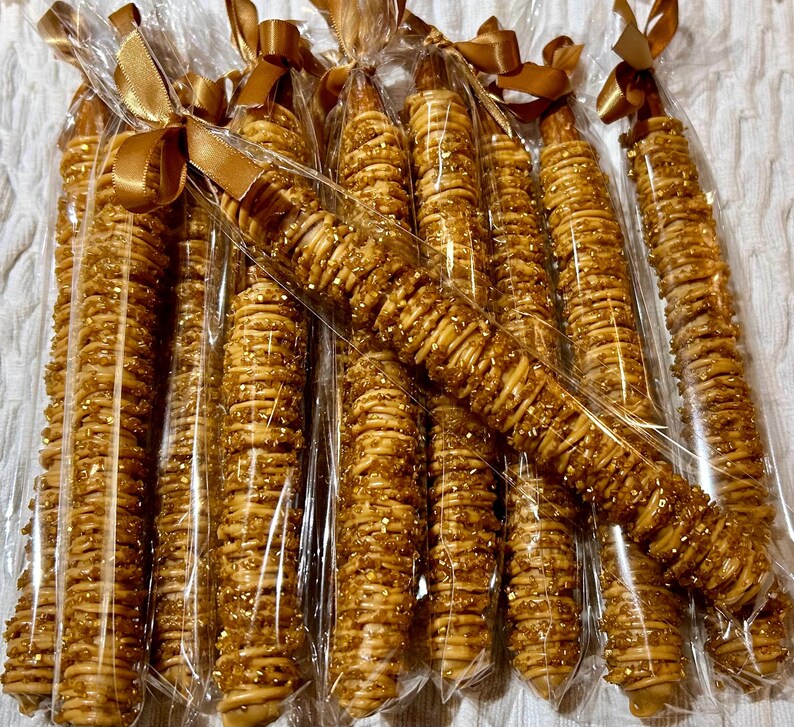 Pretzel Rods Coated in Carmel Flavored White Chocolate With Golden ...