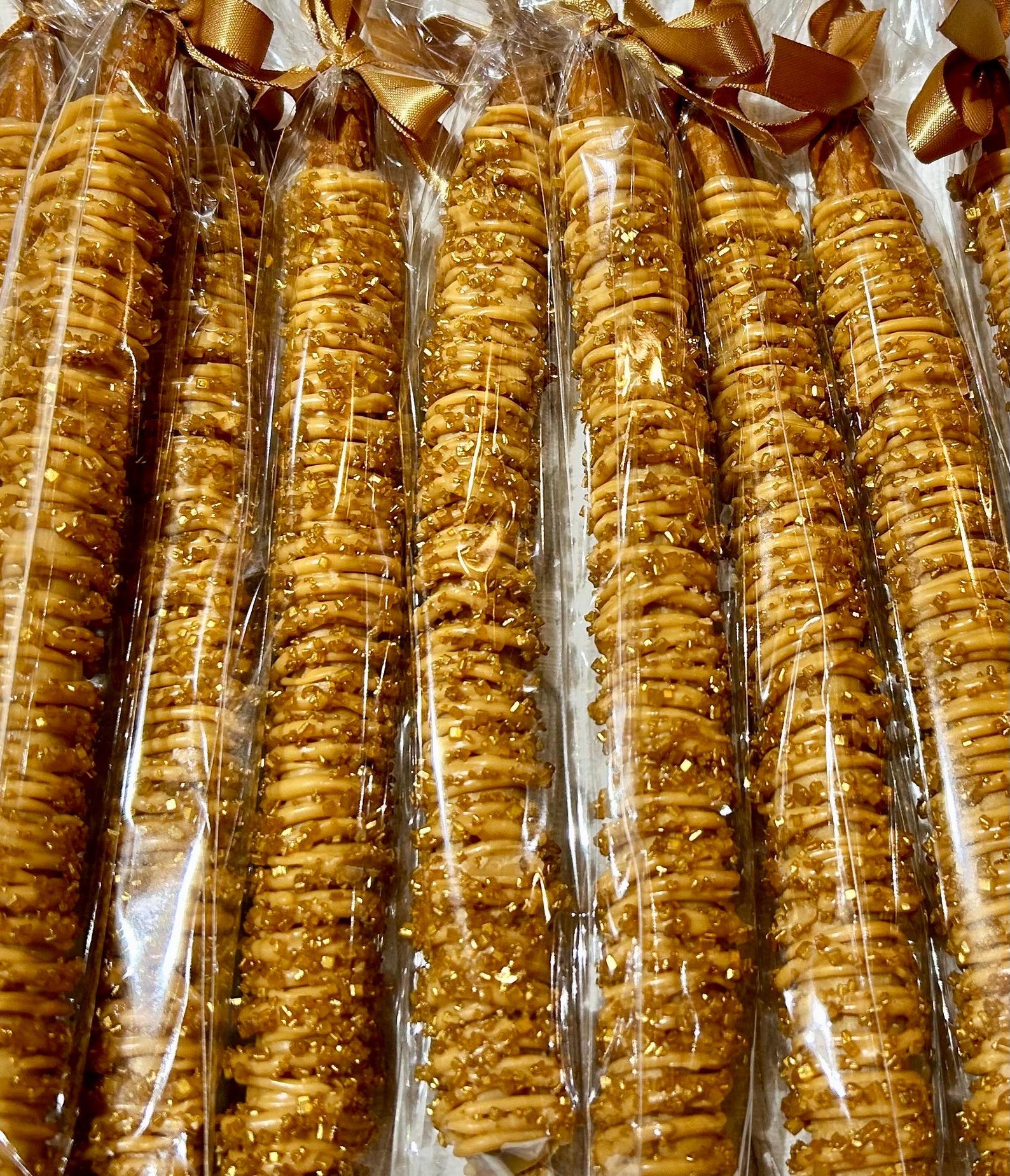 Pretzel Rods Coated in Carmel Flavored White Chocolate With Golden ...