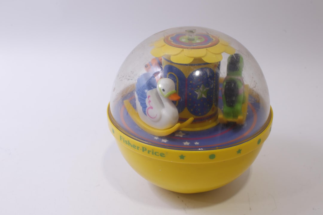 Fisher-price, 80s Roly Poly Chime Ball, Yellow and Clear, Rocking ...