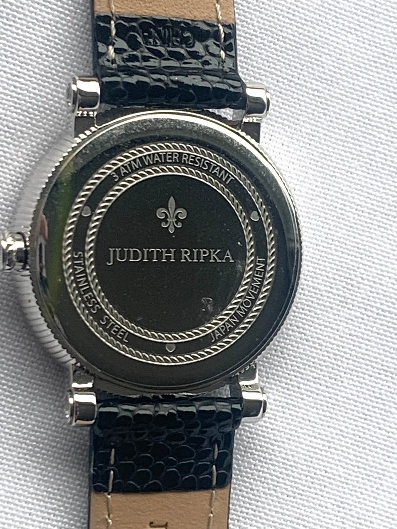 Judith Ripka Aries Zodiac Watch. Mother of Pearl Face. Black Leather ...