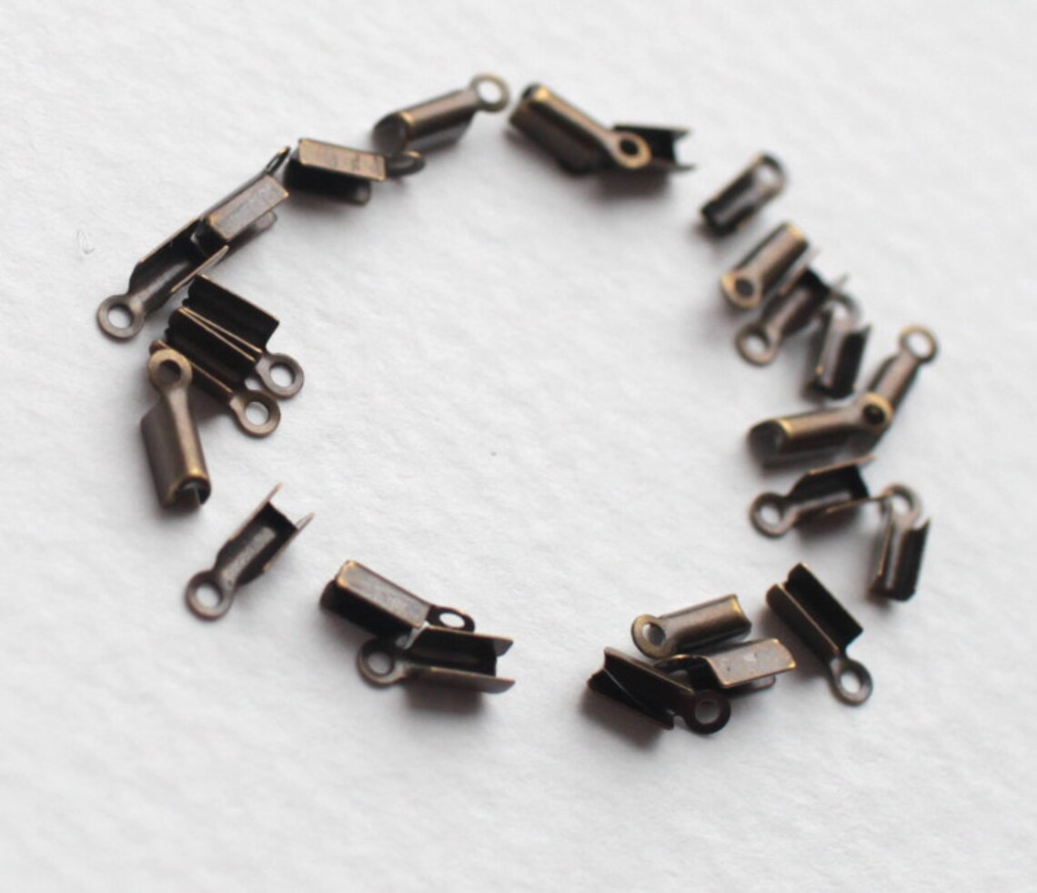 Antiqued Brass Fold Over Crimps 24X F545 - Etsy
