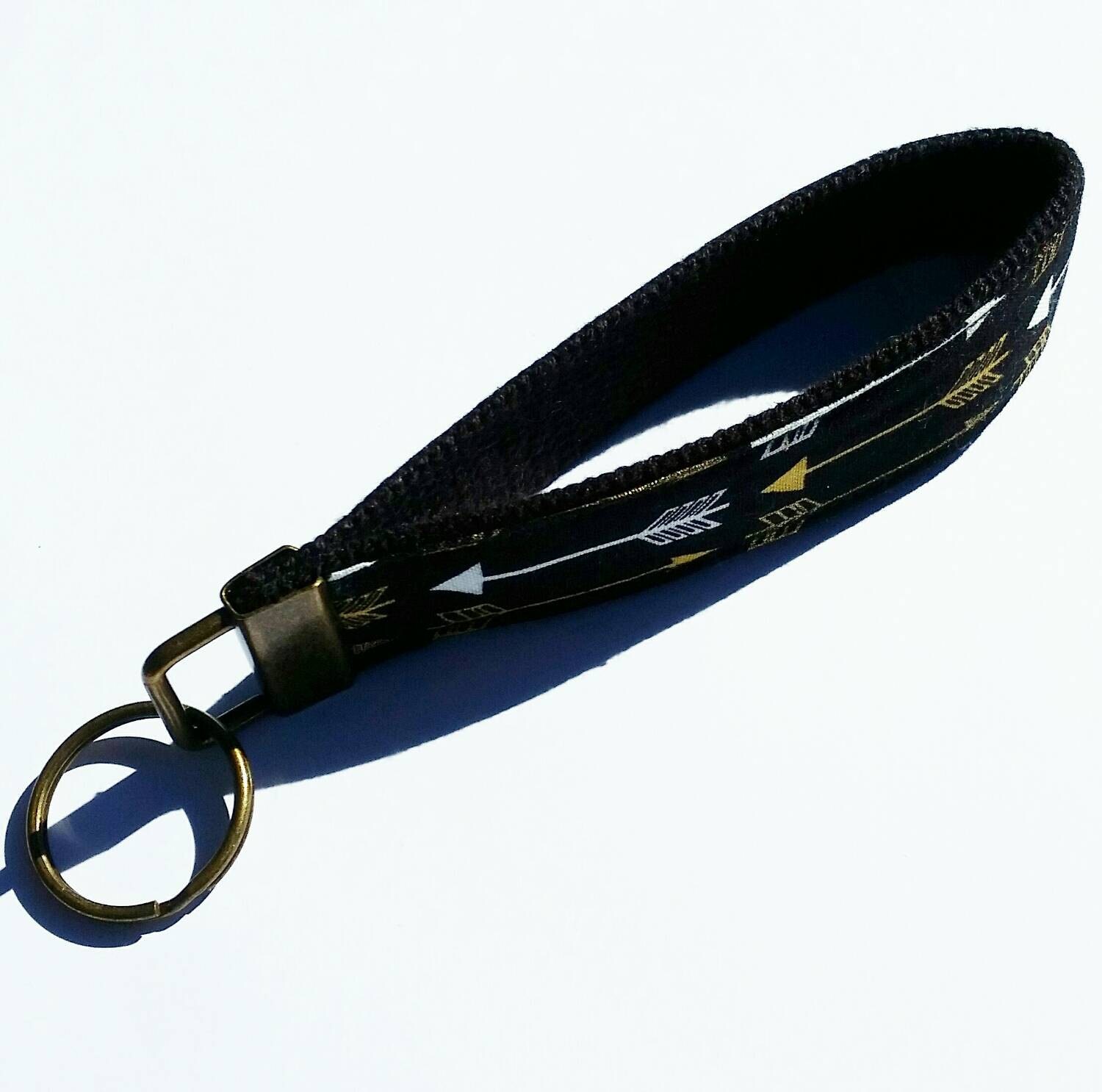 Cordón de muñeca Cordón de llave Llavero Llavero de tela Flechas de oro ...