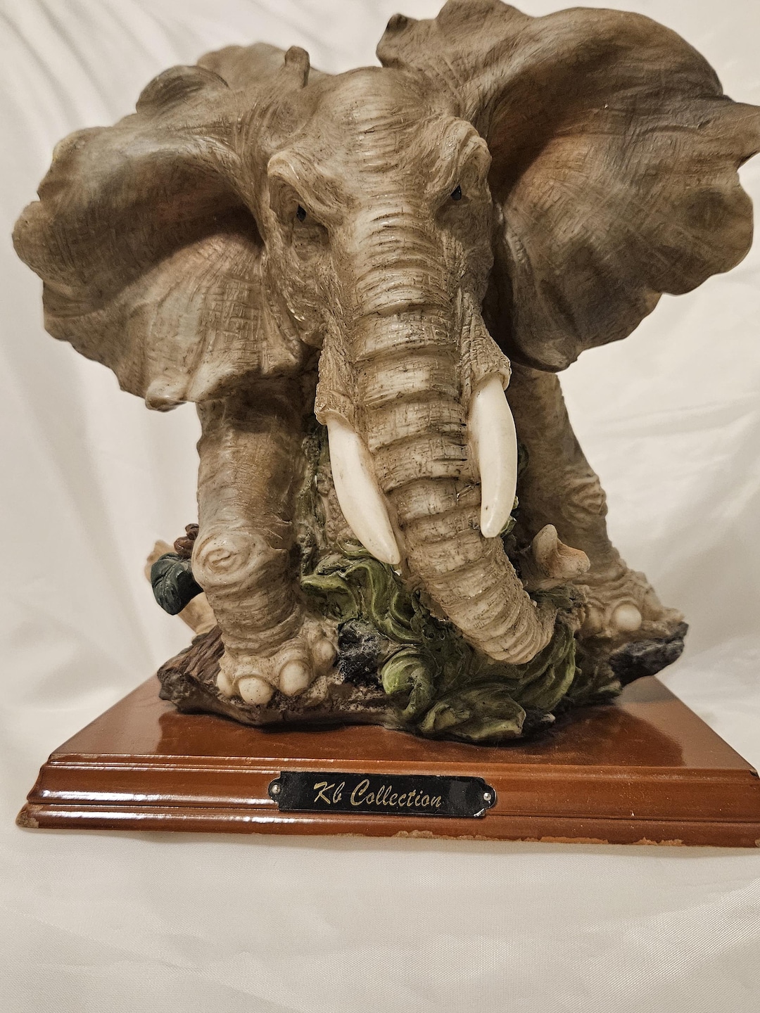 A. Belcari Sculpture of a Majestic Elephant, Featured on a Wood Stand ...