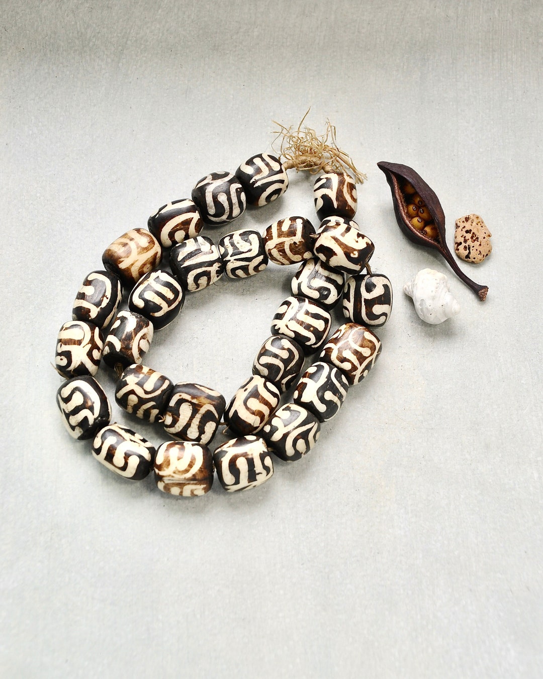 African Batik Beads - HUGE Rustic Cow Bone Barrel Beads 28" Strand on Raffia - Dyed Dark Brown ...