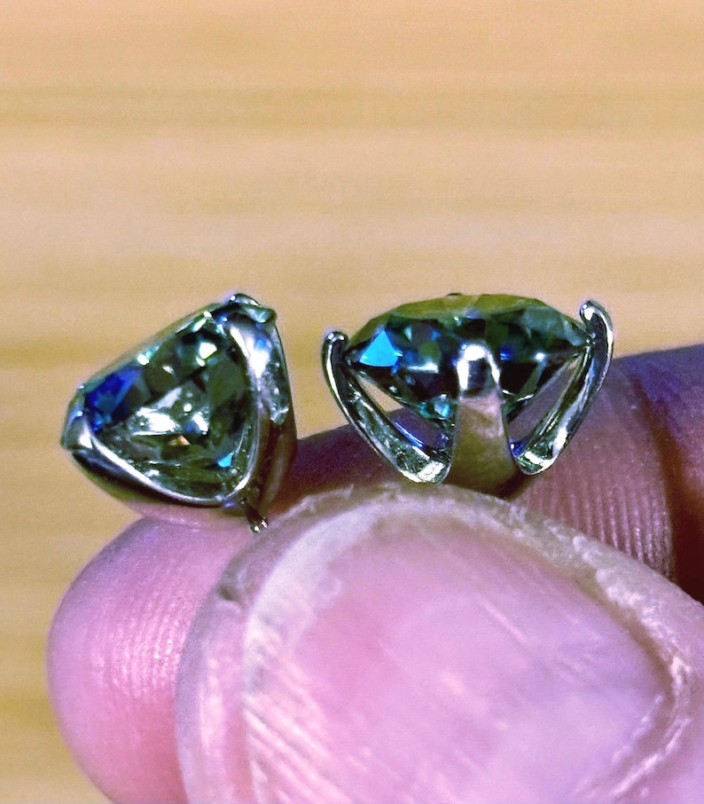Moissanite Studs. A 2cttw or 6cttw Pair of Cyan (greenish-blue ...