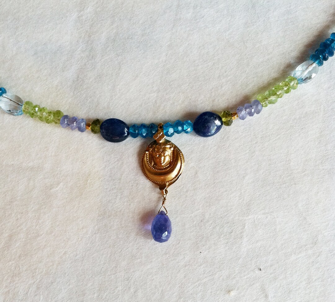 22k Antique Indian Charm Hangs Between a Sparkling Rainbow of Gems and ...