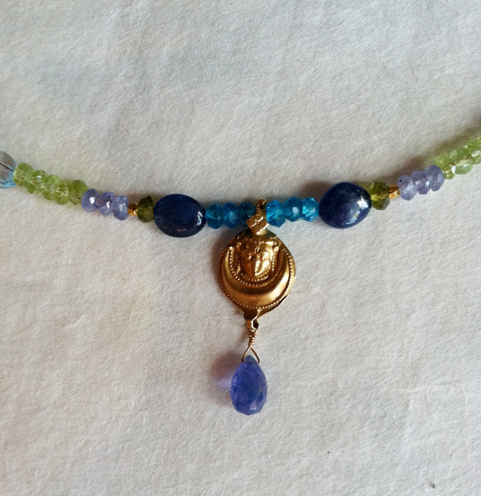 22k Antique Indian Charm Hangs Between a Sparkling Rainbow of Gems and ...