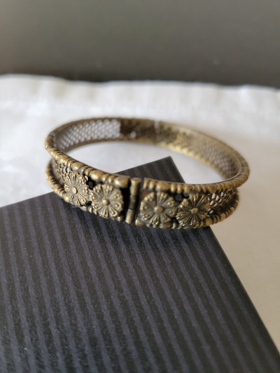 Vintage brass bangle with netting design and flower d… - Gem