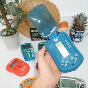 Vintage Electronic Handheld Games Y2K Poker Blackjack Solitaire TETRIS ...