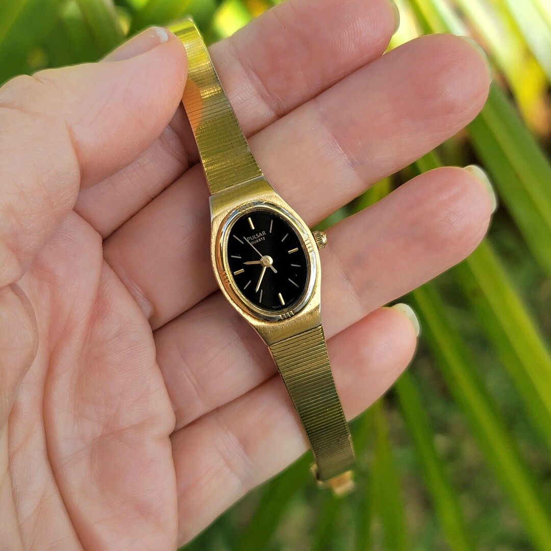 Vintage 1980s Pulsar Ladies Watch - Gold Tone Black Oval Face Cocktail ...