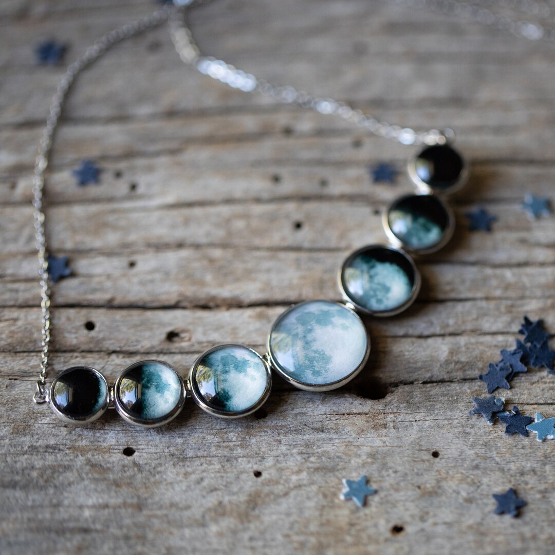 Varying Sized Curved Moon Phase Necklace in Silver - Lunar Cycle Phases ...