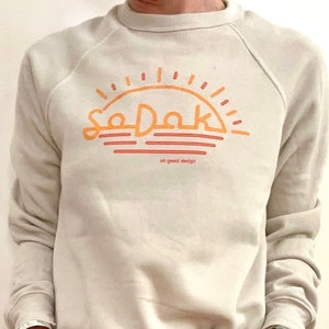 Sodak Neon Sun Crew Sweatshirt by Oh Geez! Design - South Dakota ...