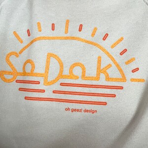 Sodak Neon Sun Crew Sweatshirt by Oh Geez! Design - South Dakota ...