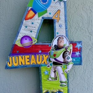 Buzz Lightyear Pinata of Numbers From 1 to 9 Space Pinatas Comets Stars ...
