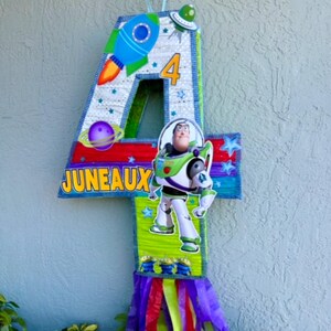 Buzz Lightyear Pinata of Numbers From 1 to 9 Space Pinatas Comets Stars ...