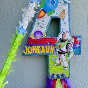 Buzz Lightyear Pinata of Numbers From 1 to 9 Space Pinatas Comets Stars ...