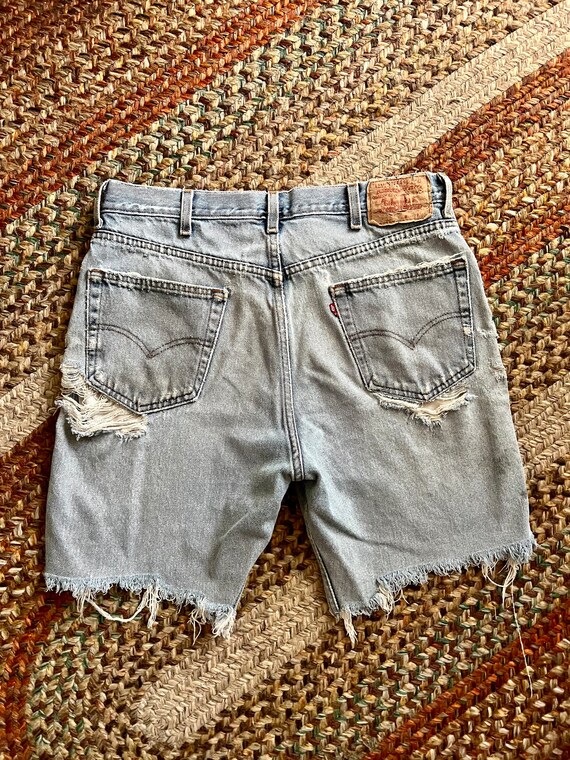 Rad 1990’s vintage ripped to shreds Levi cut offs gen… - Gem