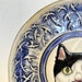 Black & White Cat Face Dish With Decorative Bird Border in Blue Ring ...